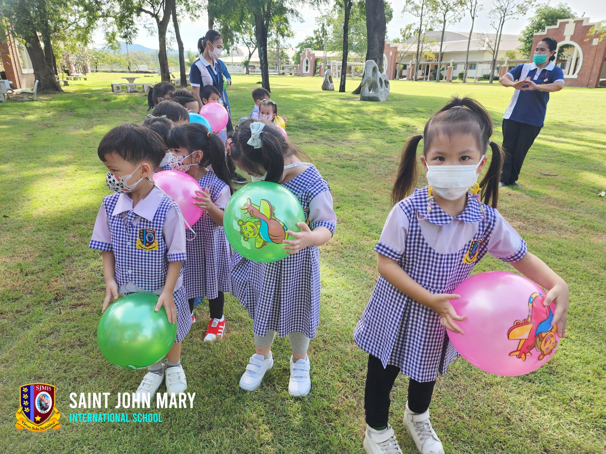 Outdoor play Hoola hoop and ball relay | Saint John Mary